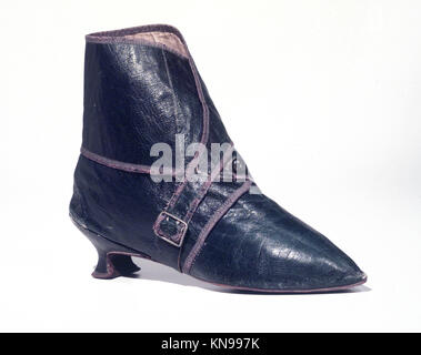 These boots demonstrate historical footwear design, showcasing fine ...