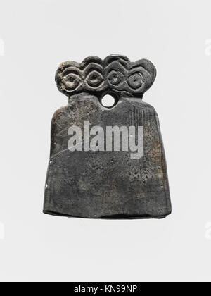 An eye idol, an ancient artifact representing a symbolic human or ...