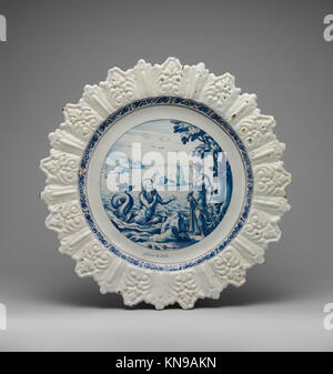 This dish features intricate design, likely reflecting the artistic ...