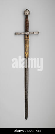 This cross hilt sword features a distinctive cross-shaped guard, common ...