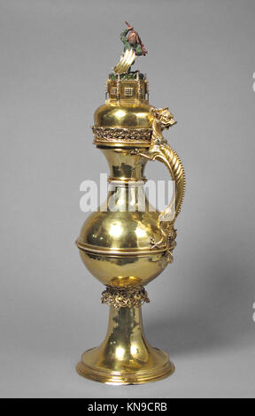 This ewer, a type of pitcher, features intricate design work and was ...