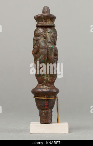 This representation of the Egyptian deity Bes depicts a stylized female ...