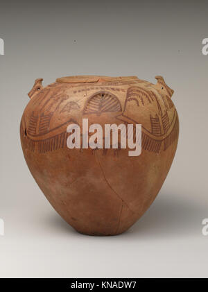 This decorated ware jar features scenes of boats and trees, providing a ...