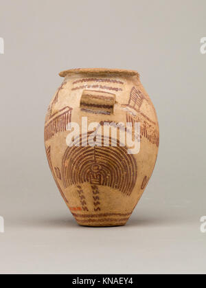 This decorated ware jar features intricate illustrations of plants ...
