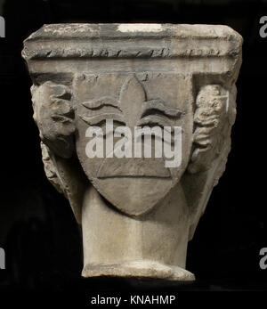 This architectural capital demonstrates classical design, stone ...