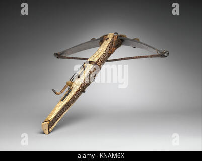 This medieval crossbow with a cranequin winder illustrates weapon ...