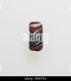 A bead from a historical collection demonstrates ancient bead-making ...