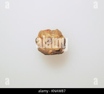 This glass eye bead, part of the MET collection, demonstrates the fine ...