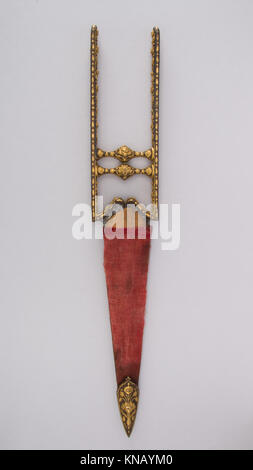 This South Asian Katar dagger features a triangular blade, distinctive ...