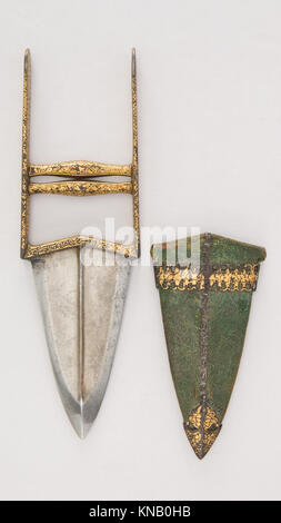 This katar, a traditional Indian dagger, comes complete with its sheath ...