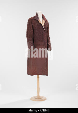This coat, designed by the renowned French fashion designer Paul Poiret ...