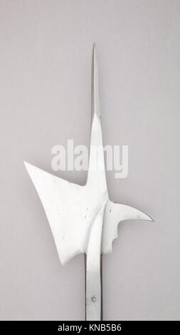 This halberd, a pole weapon used in medieval combat, features a spear ...