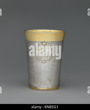 This beaker is a drinking vessel crafted from glass or ceramic, likely ...