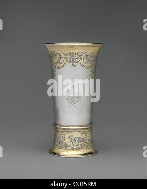 This glass beaker combines functional use and decorative design ...