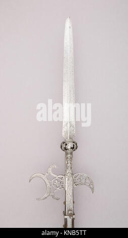 This halberd, a pole weapon from the medieval period, demonstrates the ...