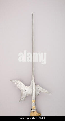 A 16th-century European halberd used for combat and ceremonial purposes ...