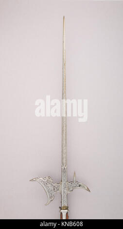 This halberd combines an axe blade and spearpoint for combat and ...