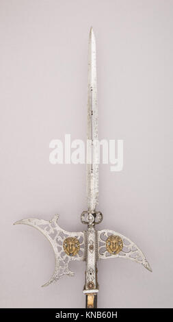 This halberd is a medieval weapon combining a spear and axe, typically ...
