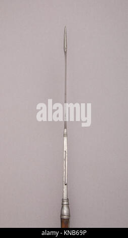 16th-century halberd combining axe blade, spear point, and hook, used ...