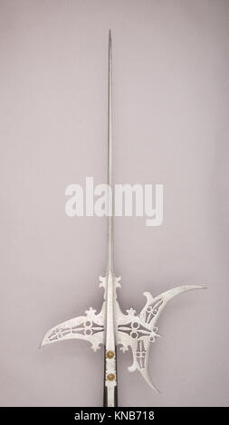 A medieval halberd pole weapon, demonstrating design, functionality ...