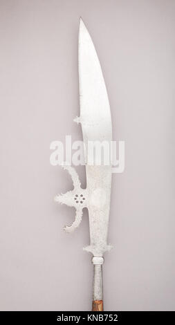 This fauchard, a type of pole weapon used in the medieval and early ...