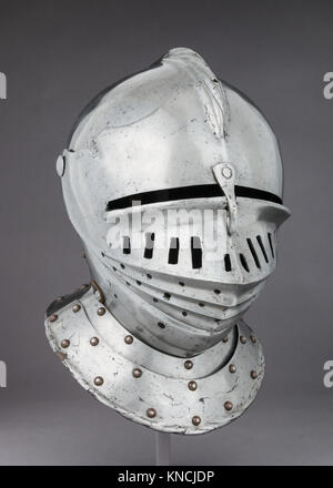 This armet helmet illustrates medieval combat armor, military ...