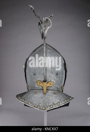 This 16th-century close helmet features a full faceplate, adjustable ...