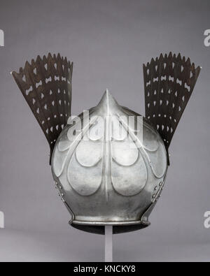 This armet and rondelle, part of medieval armor, showcases the ...