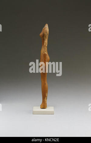 This female figure sculpture exemplifies ancient artistic techniques ...