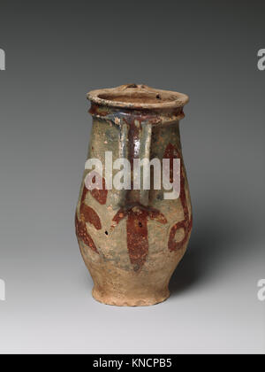 This barrel-shaped jug displays a fox and cockerel motif, illustrating ...