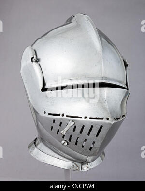 A medieval armet helmet providing full head protection in combat ...