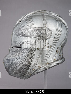 This item is an armet, a type of medieval helmet used for protection in ...