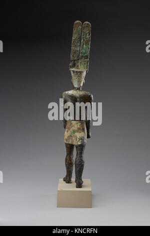 This sculpture of Amun, an Egyptian god, illustrates the cultural and ...