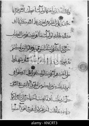 This folio from a Qur'an manuscript showcases Arabic calligraphy and ...