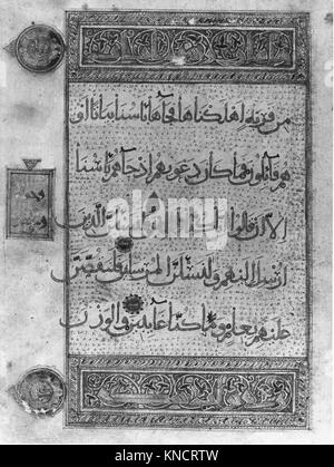 A folio from a Qur'an manuscript, showcasing intricate calligraphy and ...