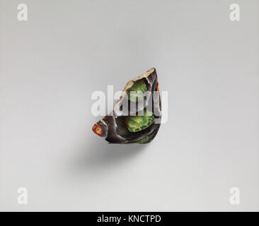 This glass mosaic box fragment, known as a pyxis, features intricate ...