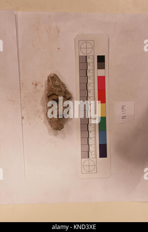 This fragment is a partial artifact or artwork, reflecting historical ...