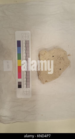 This fragment, representing a portion of a larger historical object ...