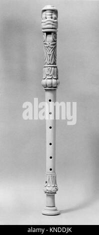 A woodwind alto recorder in F, MET DP105124, featuring finger holes and ...