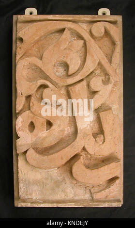 This fragment of a frieze features intricate carvings that may ...