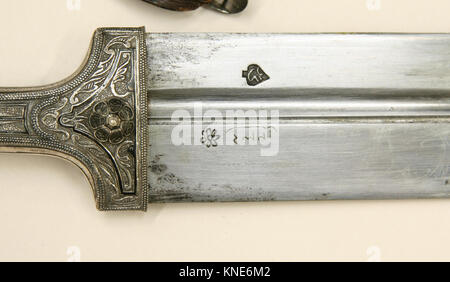 This Kindjal dagger from the Caucasus has a curved blade and scabbard ...