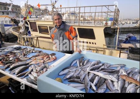 A fisherman selling fresh fish at Marseille fish market, one of the ...