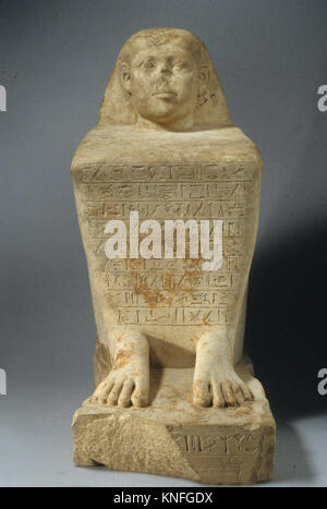 This ancient Egyptian block statue depicts a prophet of the god Montu ...