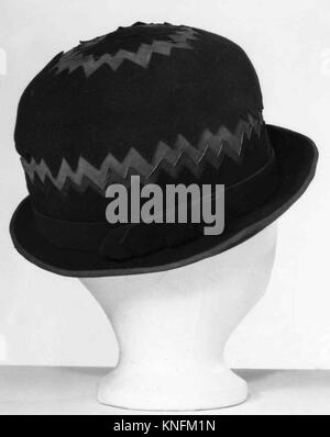 This hat represents period-specific fashion, showcasing materials ...