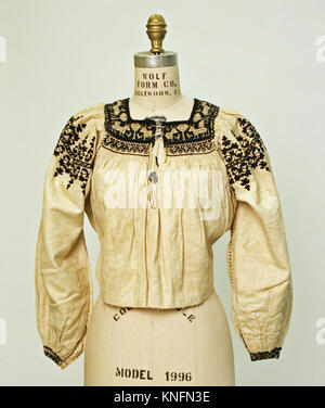 This blouse, part of the MET collection, reflects the fashion trends of ...