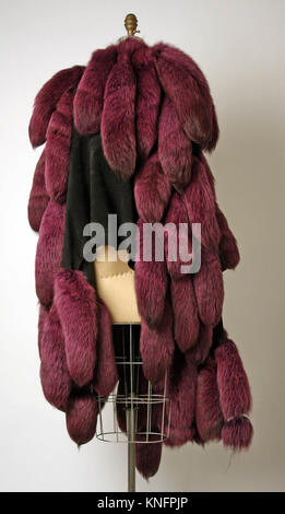 This historical cape illustrates high-status fashion, luxurious ...