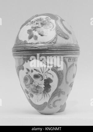 This box, crafted from materials typical of the period, reflects the ...