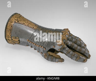 This medieval left-hand gauntlet demonstrates protective armor design ...