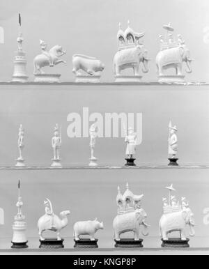 This set of 32 chessmen represents a complete set of pieces used for ...