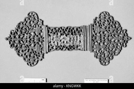 This book clasp, crafted from metal, was used to secure books in ...